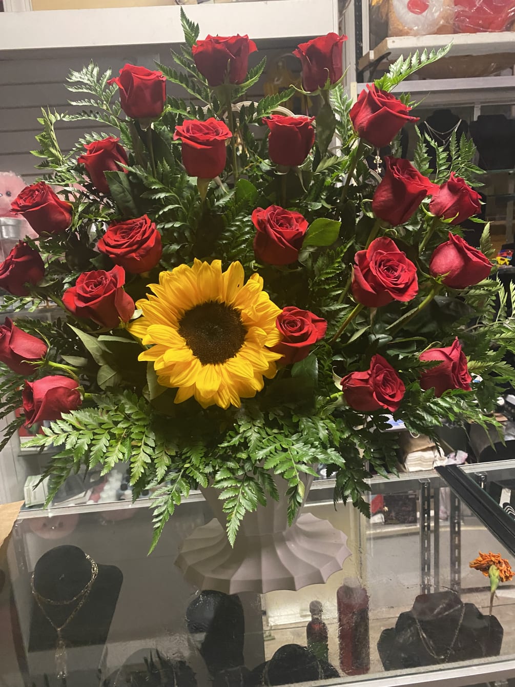 Roses and sunflower by Lira’s Flowers & Events LLC