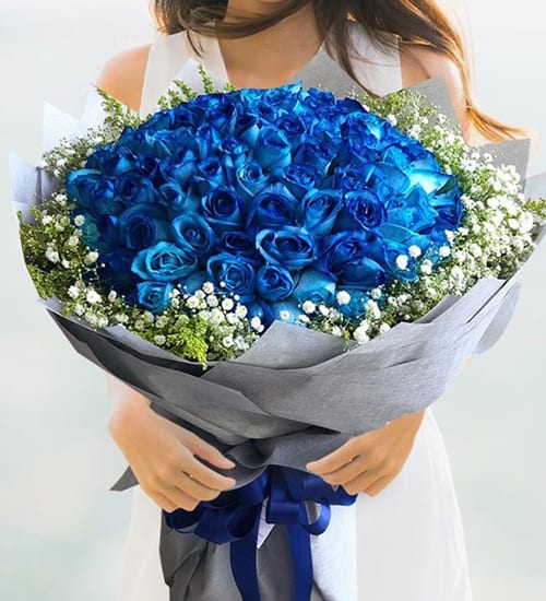 5 Dozen blue Roses bouquet by Rubi's Flower Shop