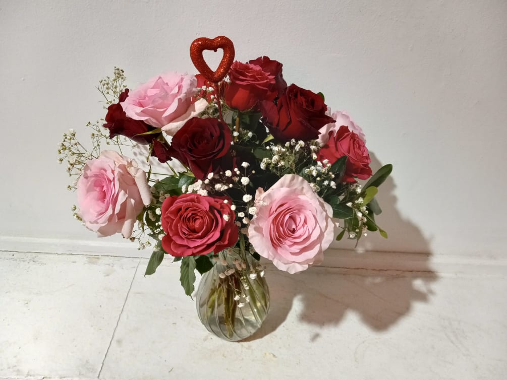 Red, hot pink & light pink roses in a vase by Elena's Flowers