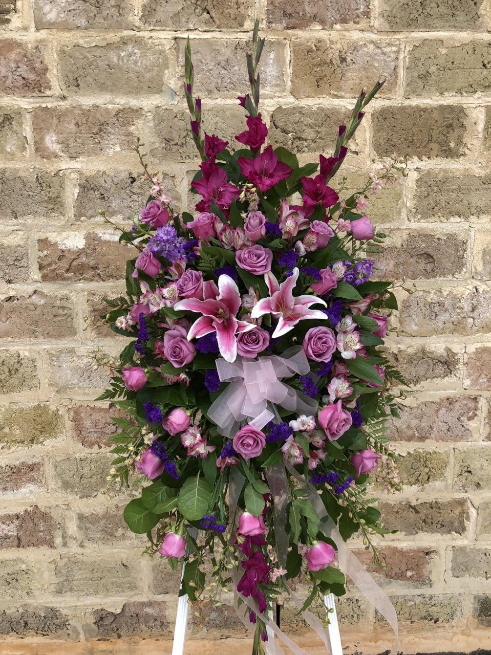 Warmest Farewell Spray by Heavenly Floral Designs
