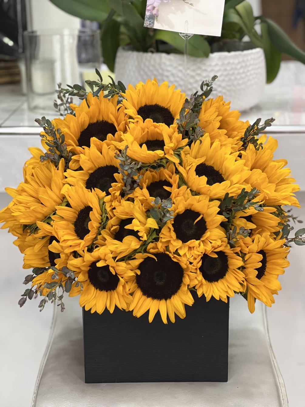 sun flowers box by Paradise Flowers & Design