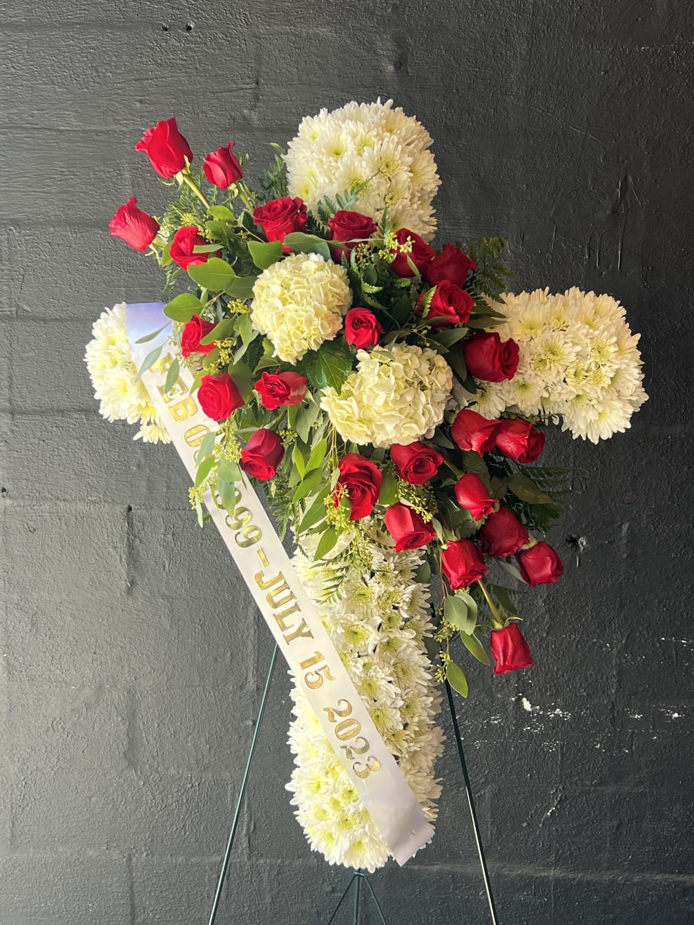 red rose and white cross by Flower Studio San Diego