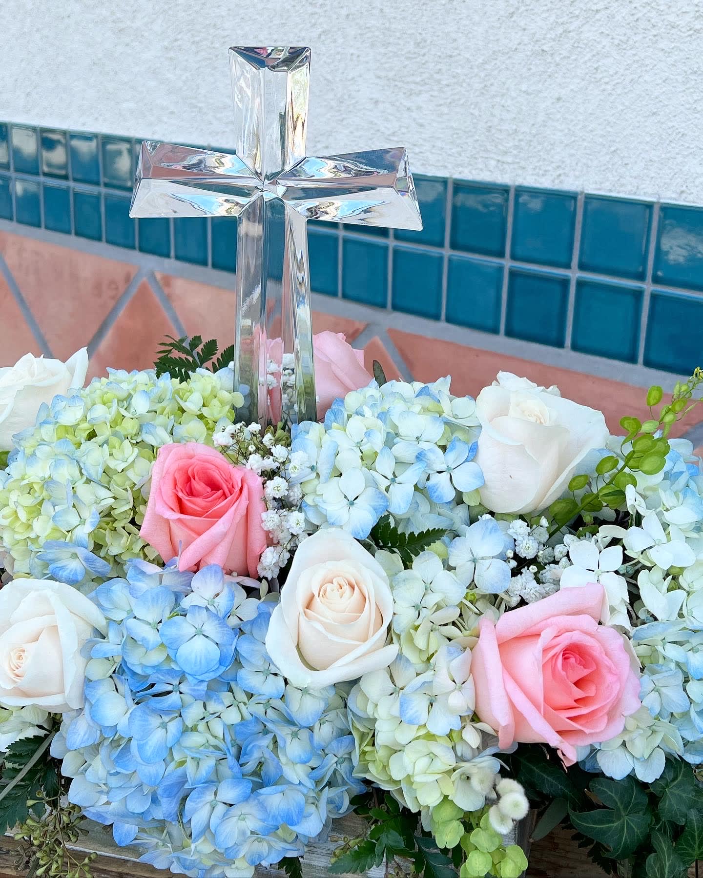 pastel flower with crystal cross in Highland, CA | Hilton's Flowers
