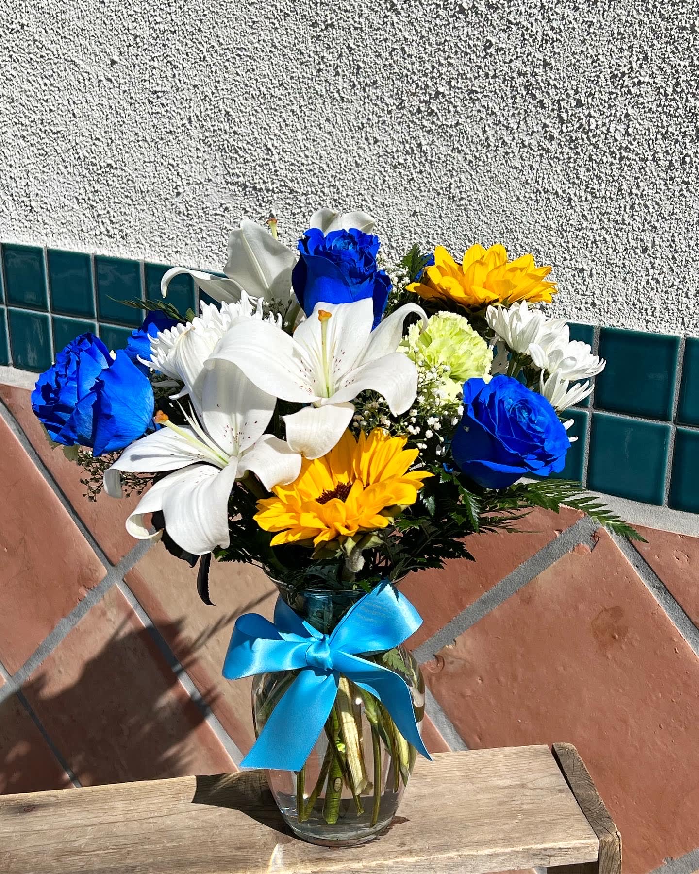 Blue roses and sunflowers bouquet in Highland, CA | Hilton's Flowers