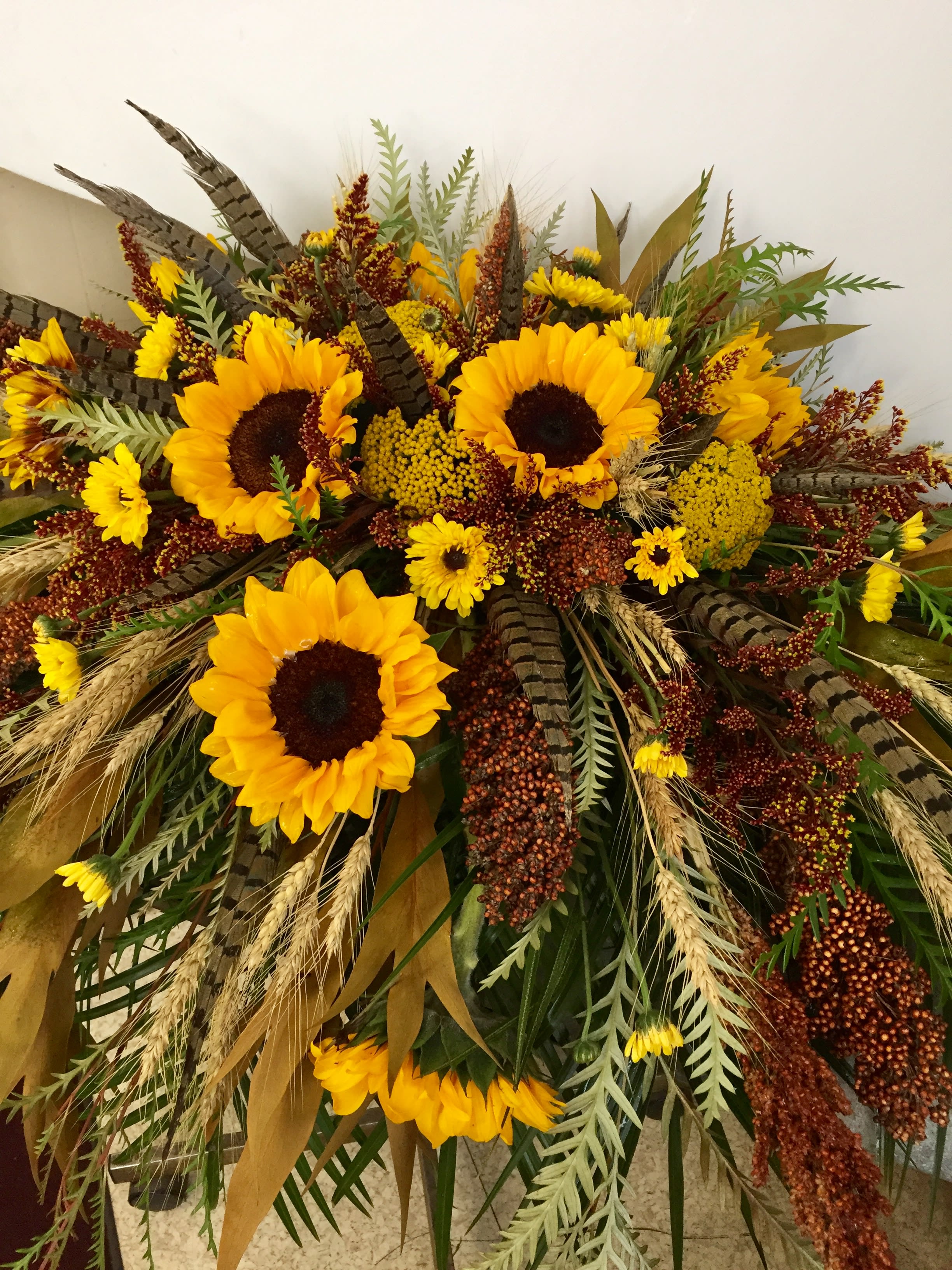 Fall outdoor casket spray in Pratt, KS | The Flower Shoppe