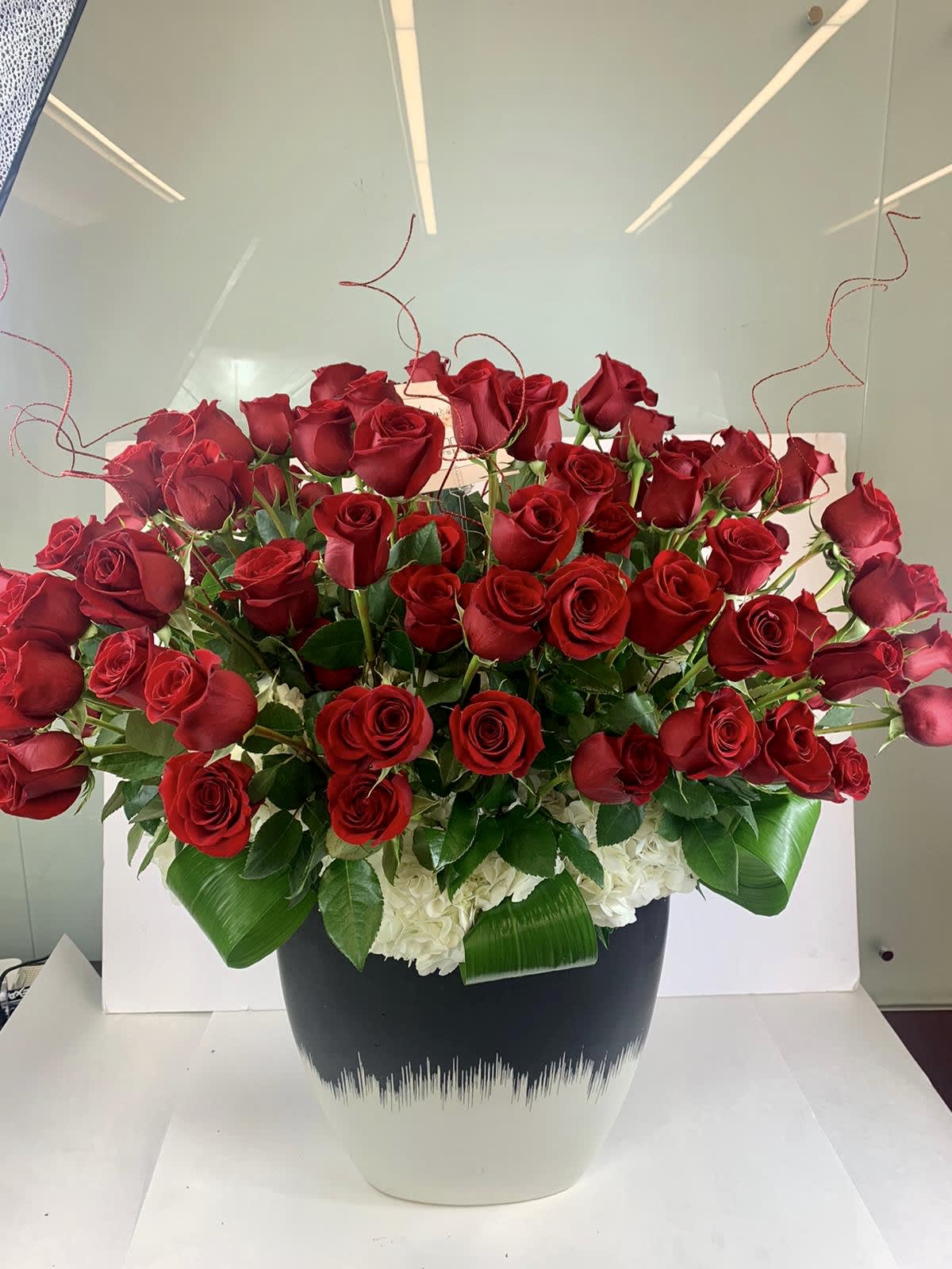 100 Long stem roses in Irvine, CA | OC Flowers and Events