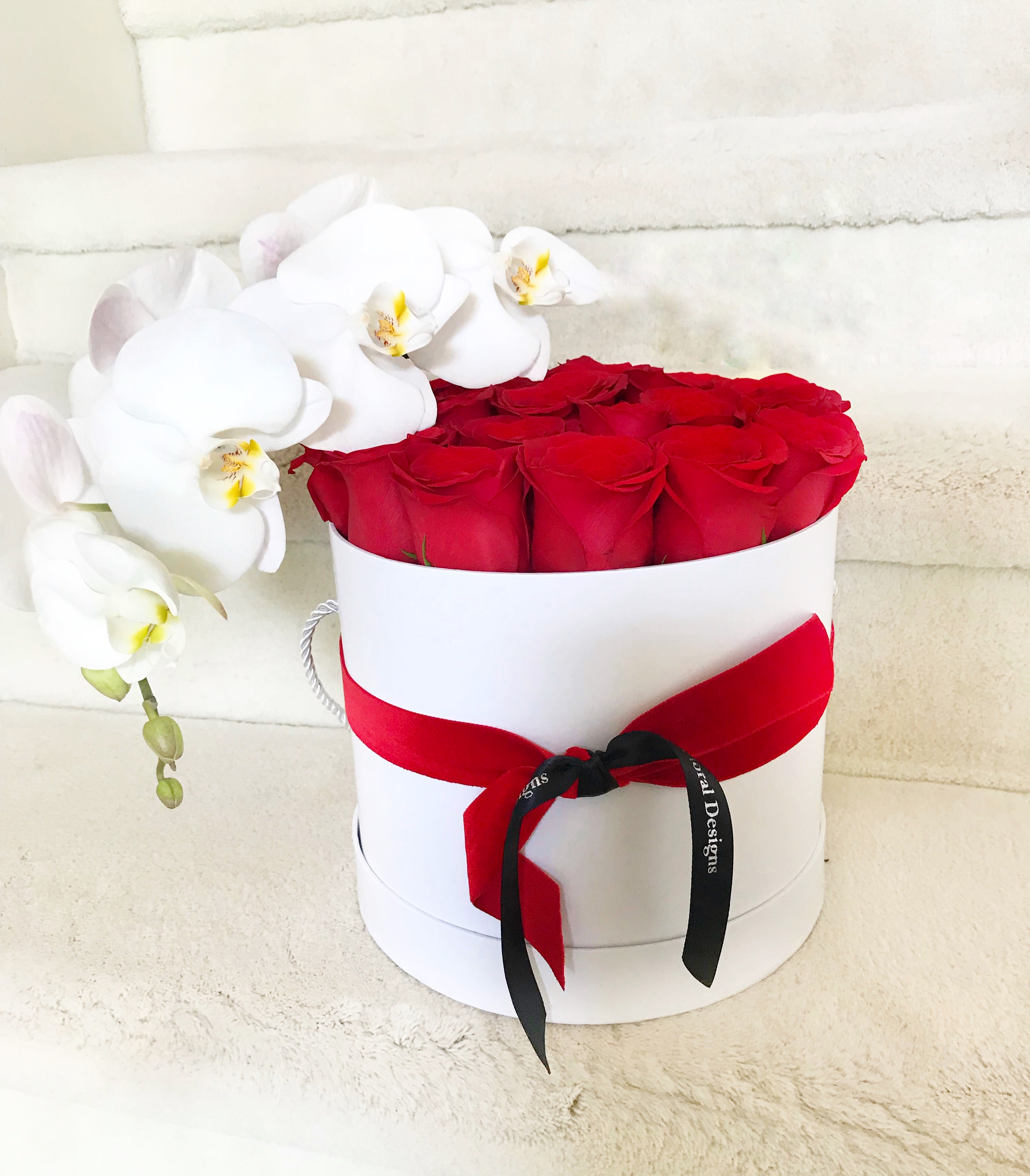 Red Roses and Orchids in a Box in Calabasas, CA | Carola's Floral Designs