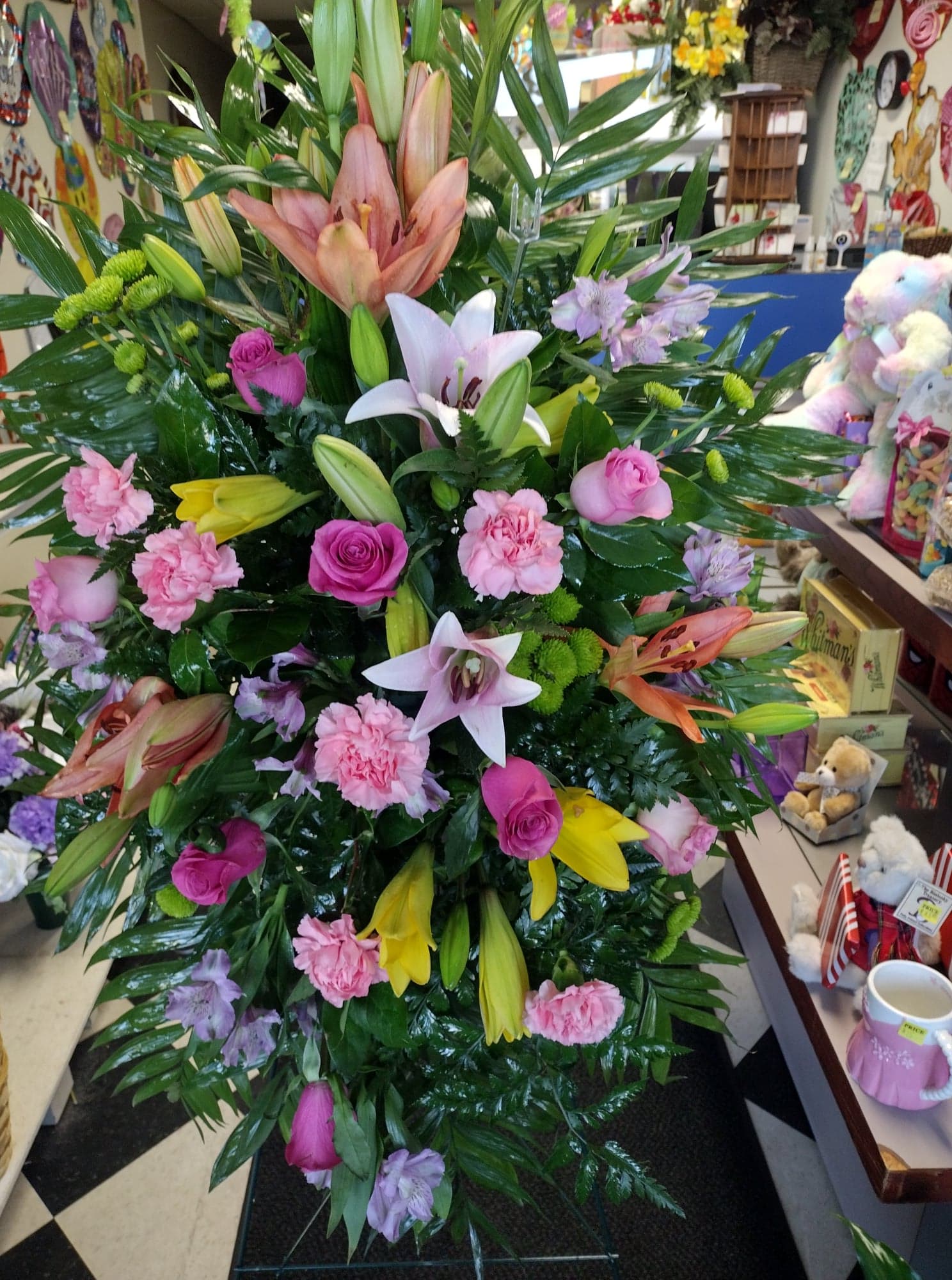 Rainbow Standing Spray by Zontini Event Decorators Flowers and Balloons