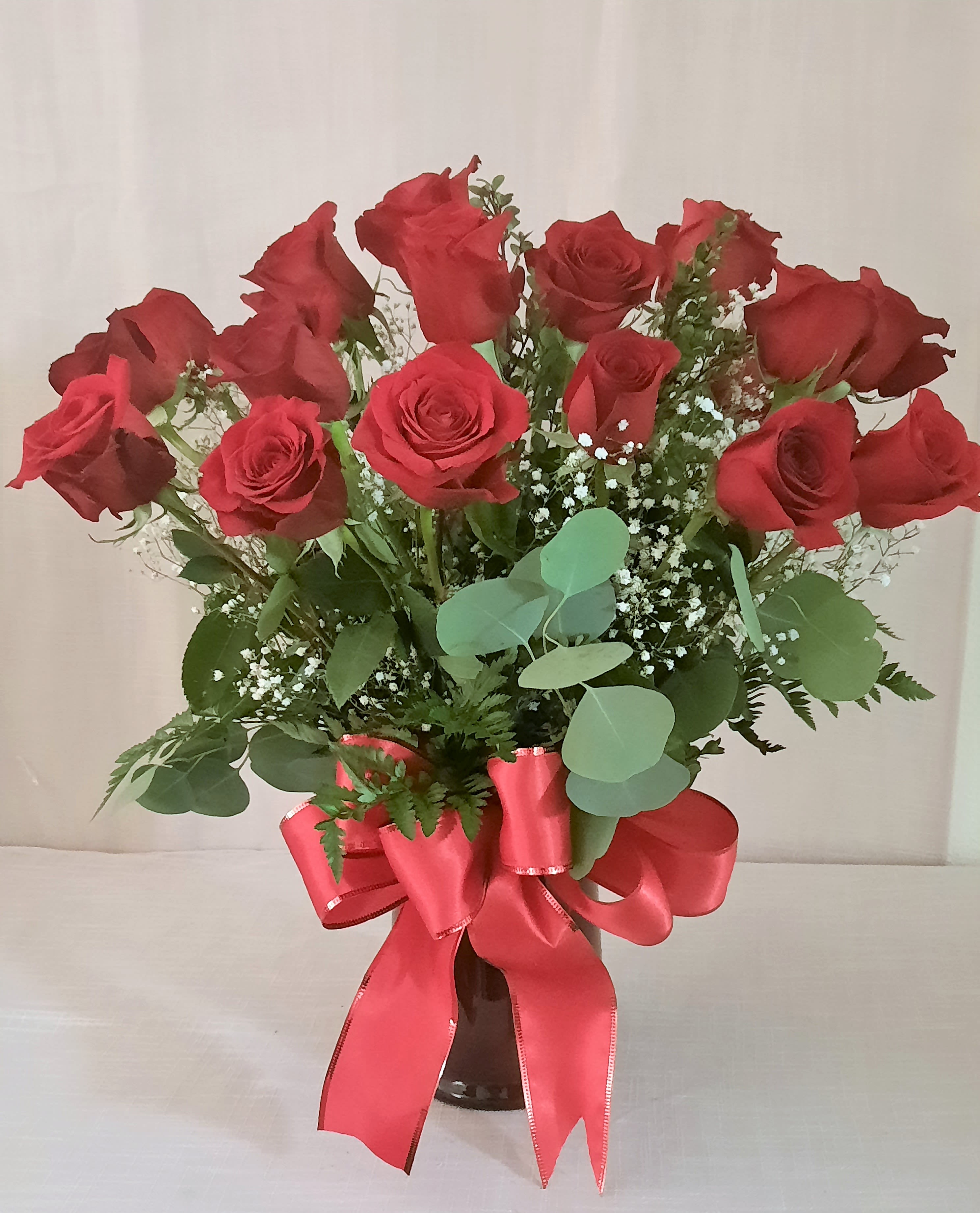 18 Red Roses shows Love by Secret Garden Florals