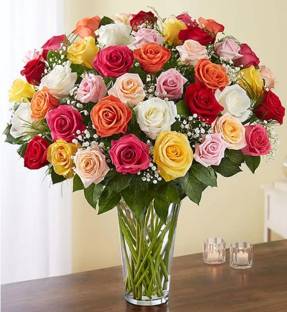 Sixty Multi-Color Roses Arrangement by The Sidewalk Garden