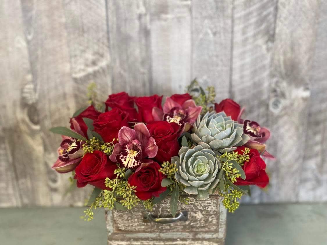 Rustic Succulents and Red Roses by Diana's Flowers
