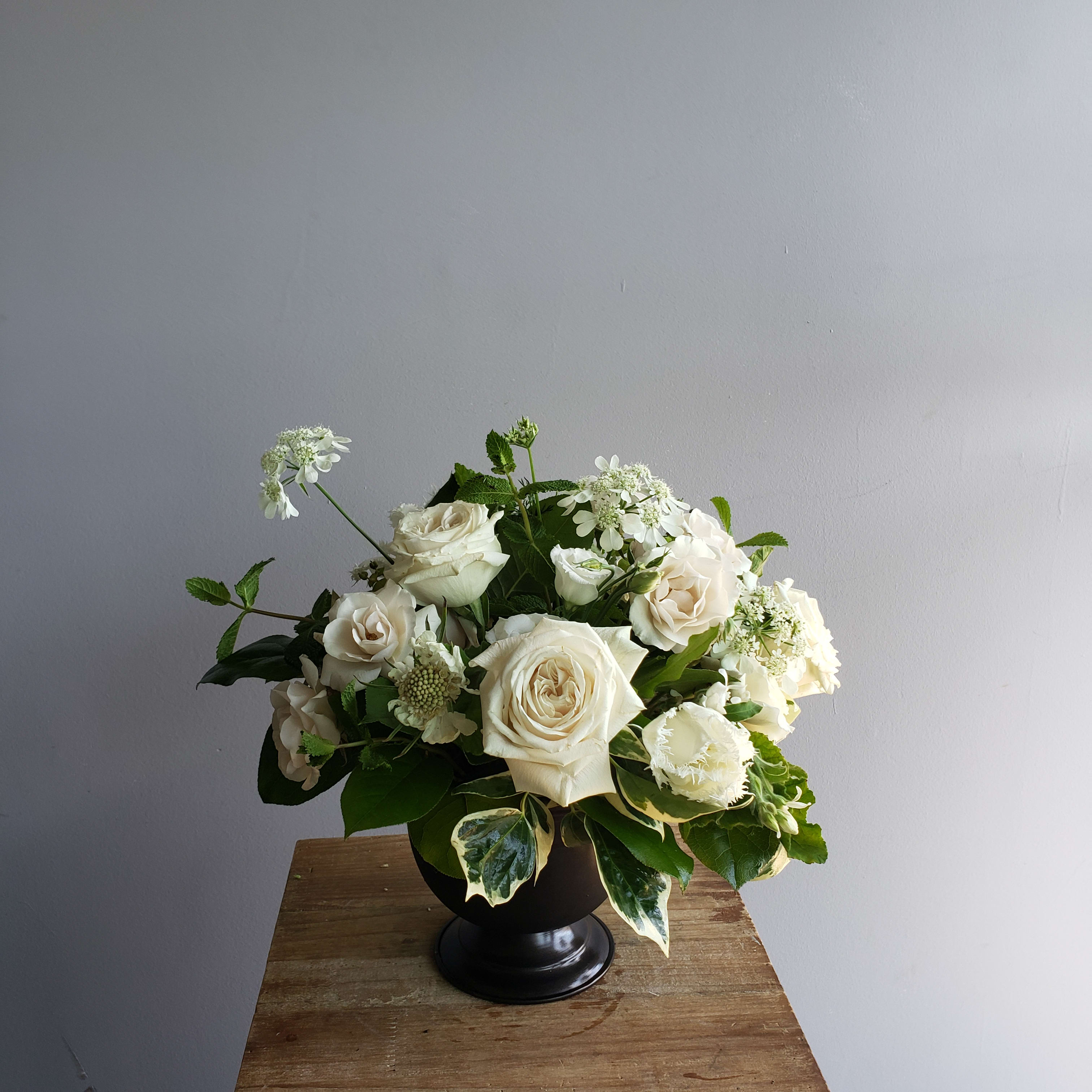 Classic White Compote Centerpiece by Isha Foss Design