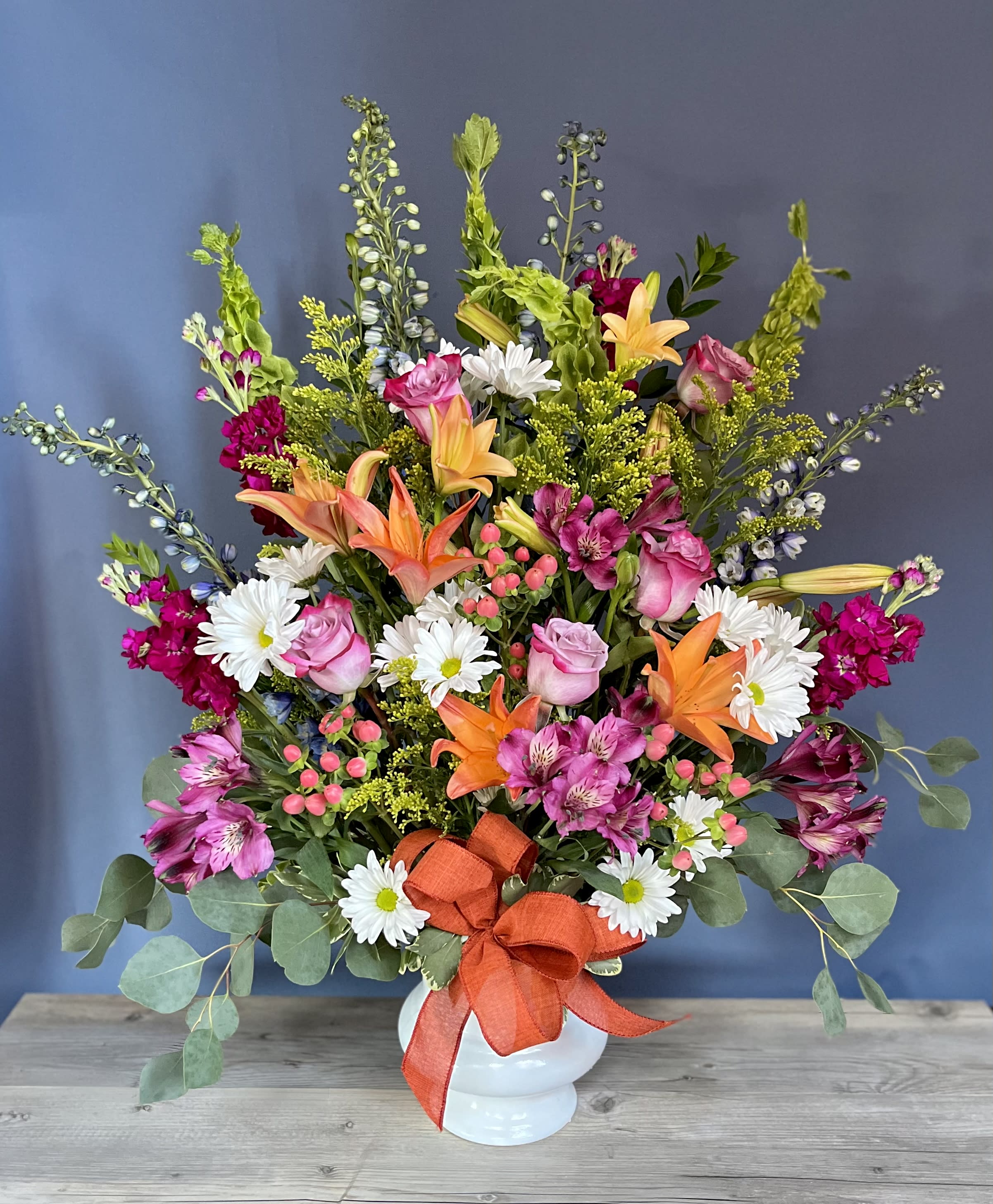 Colorful Sympathy Arrangement by Lauren Quinn Flower Boutique