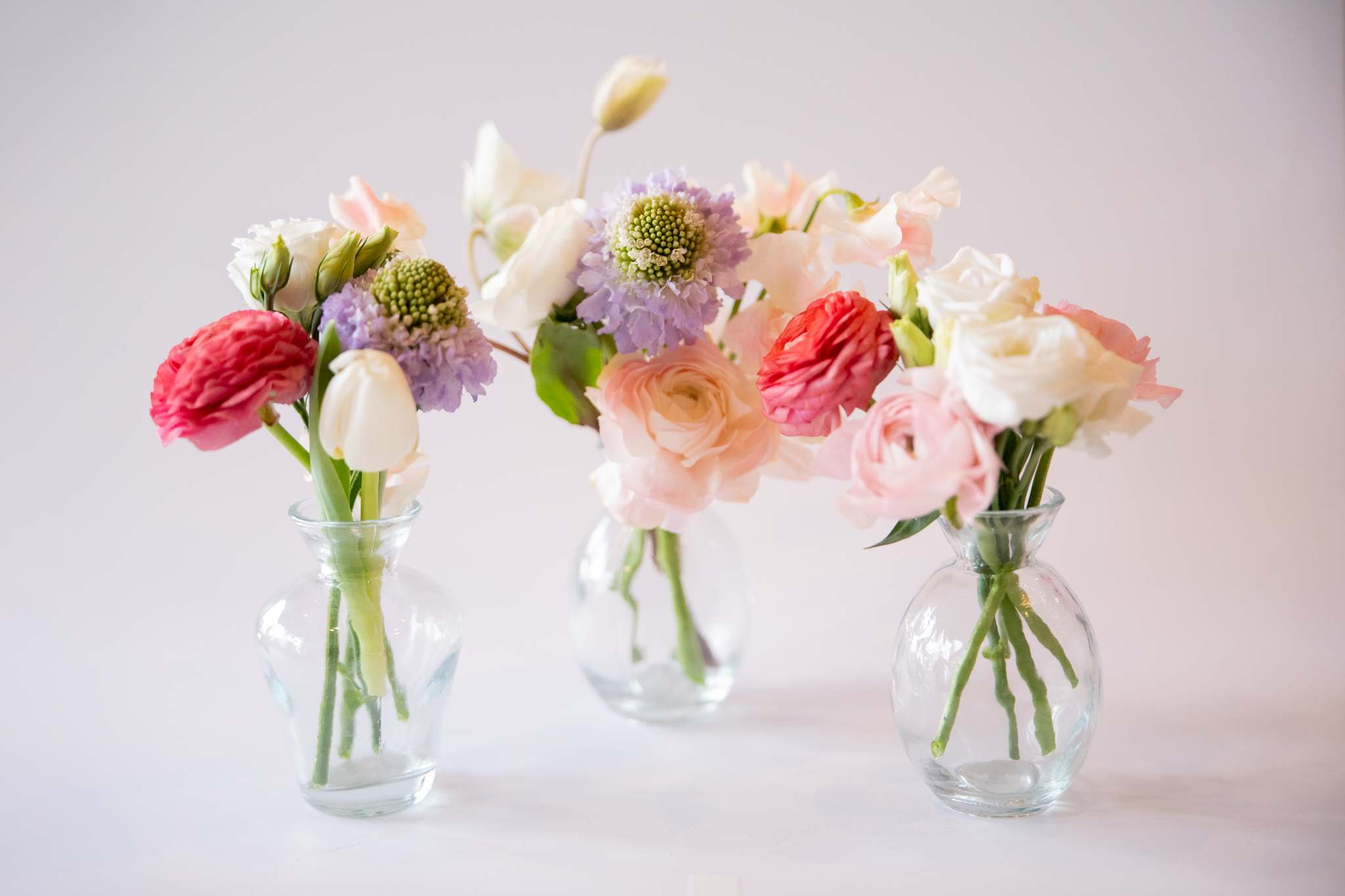 Small vases with flowers store
