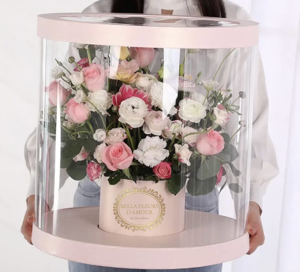 Large pink cylinder display floral arrangement by Bella Fleurs D' Amour