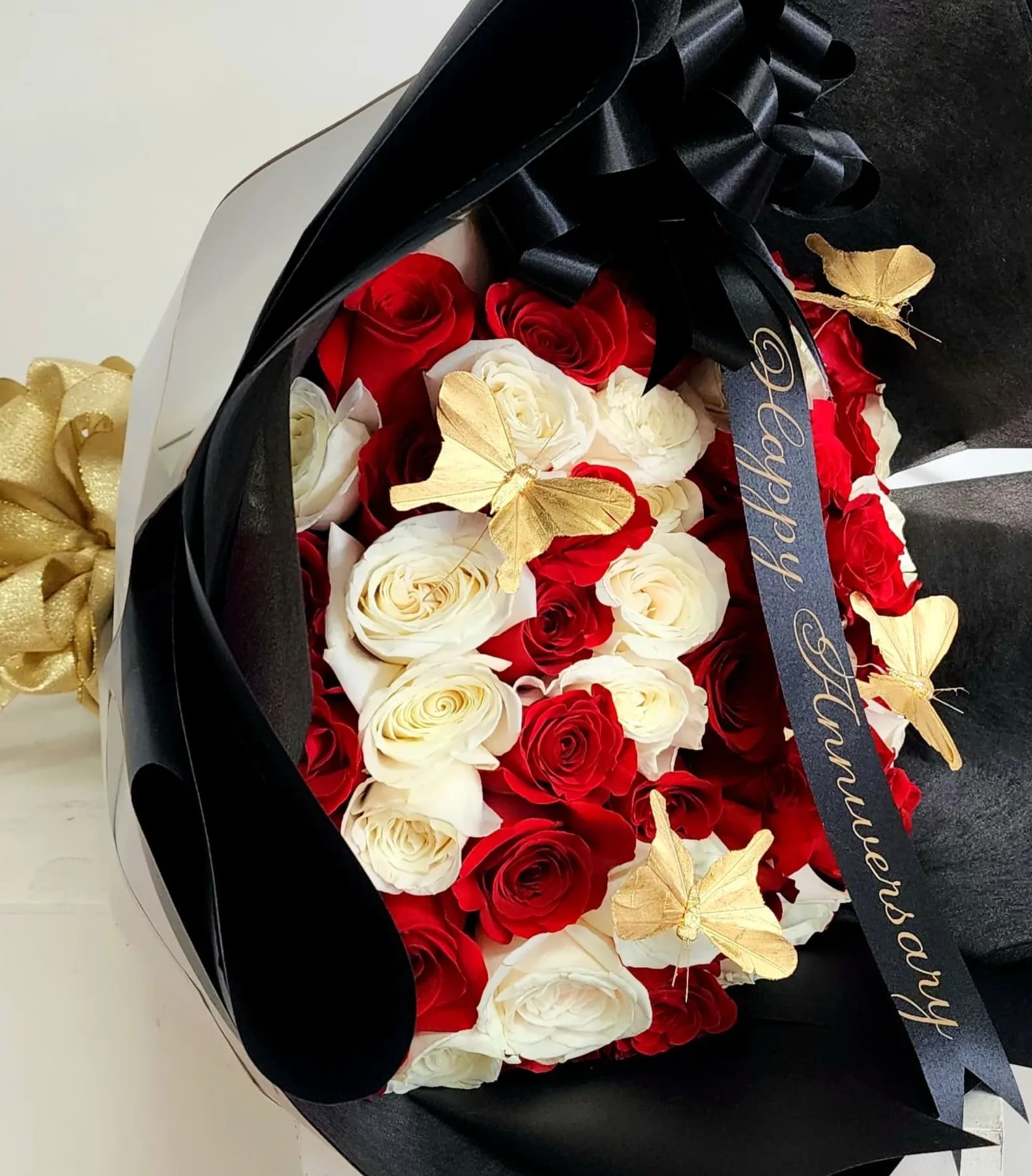 60 Rose Wrapped Bouquet With Message by Chita's Floral Designs