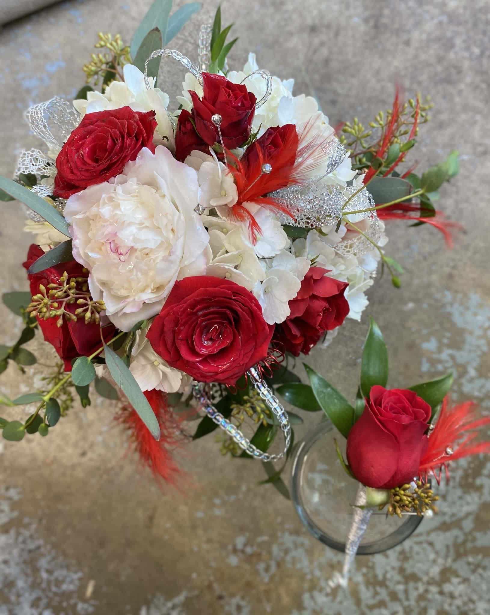 Extravagant Red Prom Bouquet and Boutonniere by Bennett's Flowers