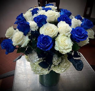 Ceramic Skies Blue White Roses Amidst Green Tea Leaves in BEVERLY HILLS CA Muguet Florist