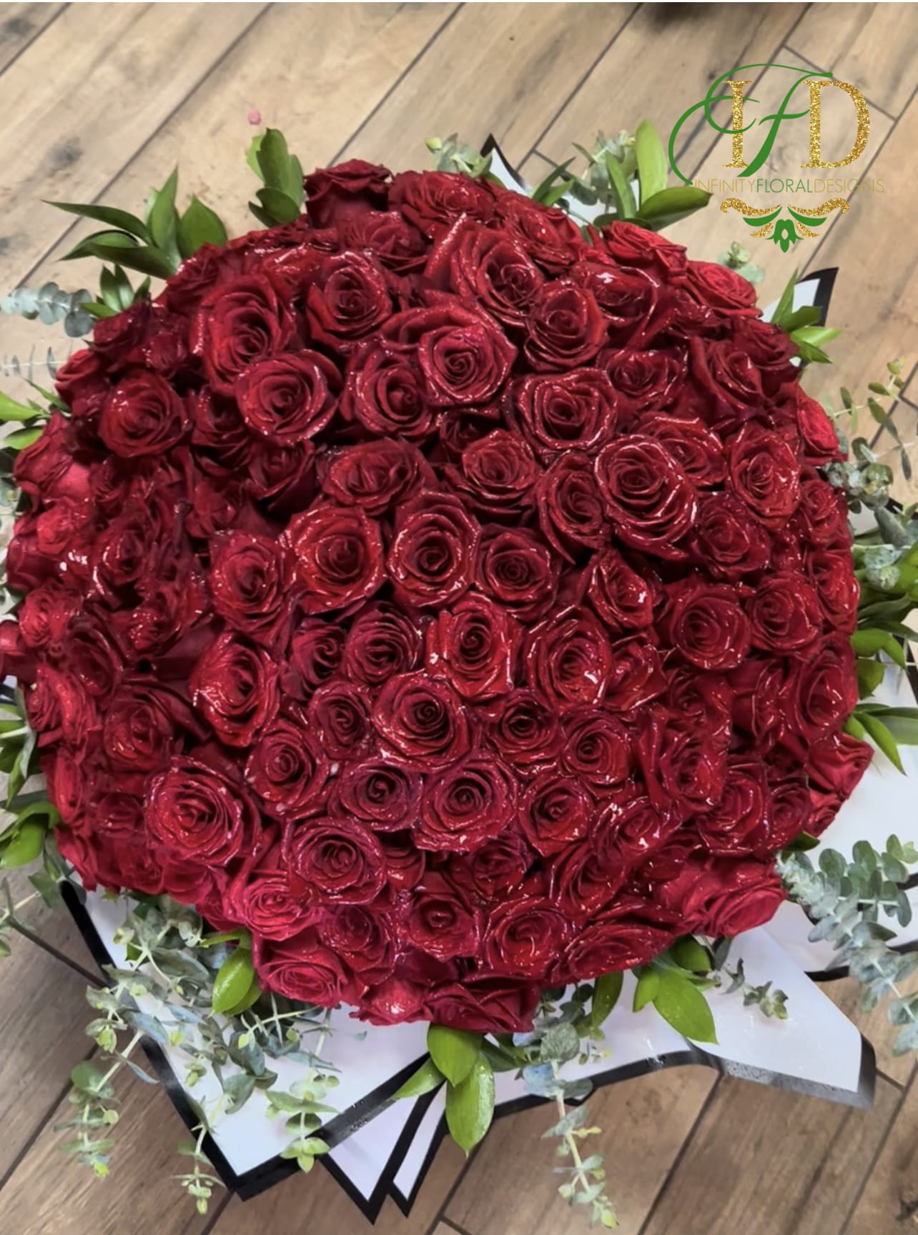 Luxury100 Wrapped Rose Bouquet by Infinity Floral Designs