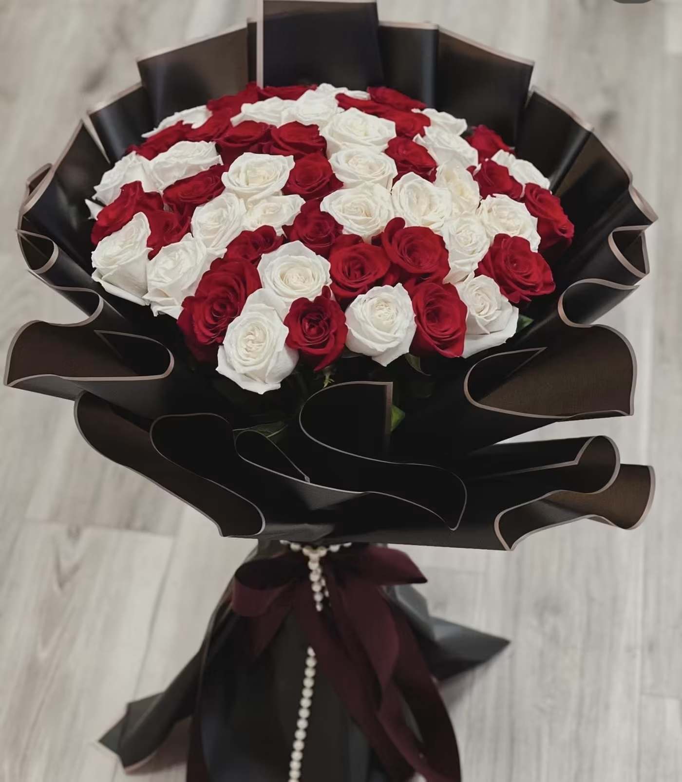 50 classic roses with nice wrapping. in Jacksonville, FL | D Florals