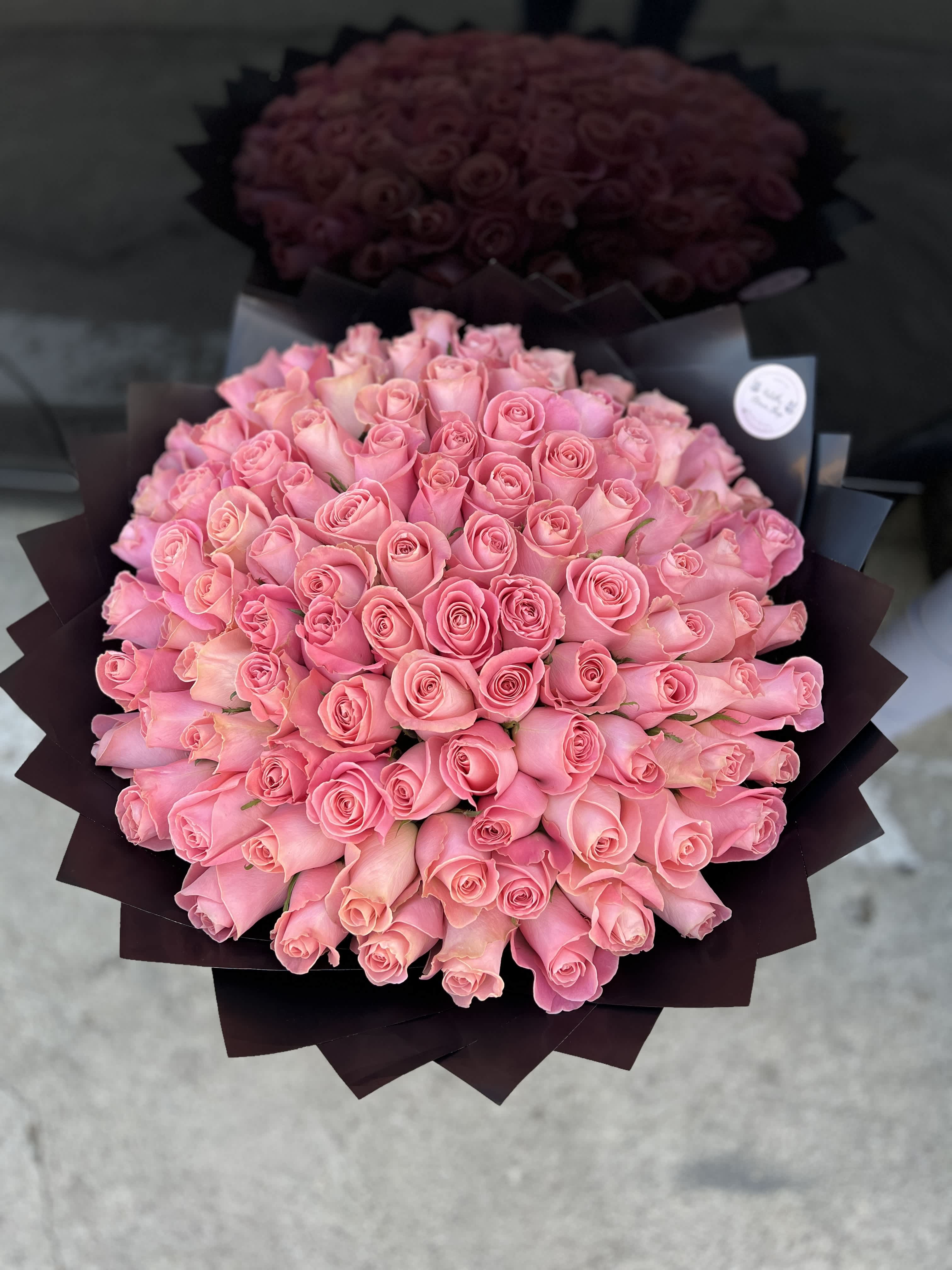 100 - Pink Roses Bouquet With Black Wrapping Paper by Arleth’s Flower Shop